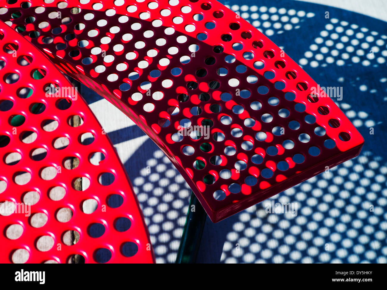 Abstract photograph of colorful red patio table and bench Stock Photo ...
