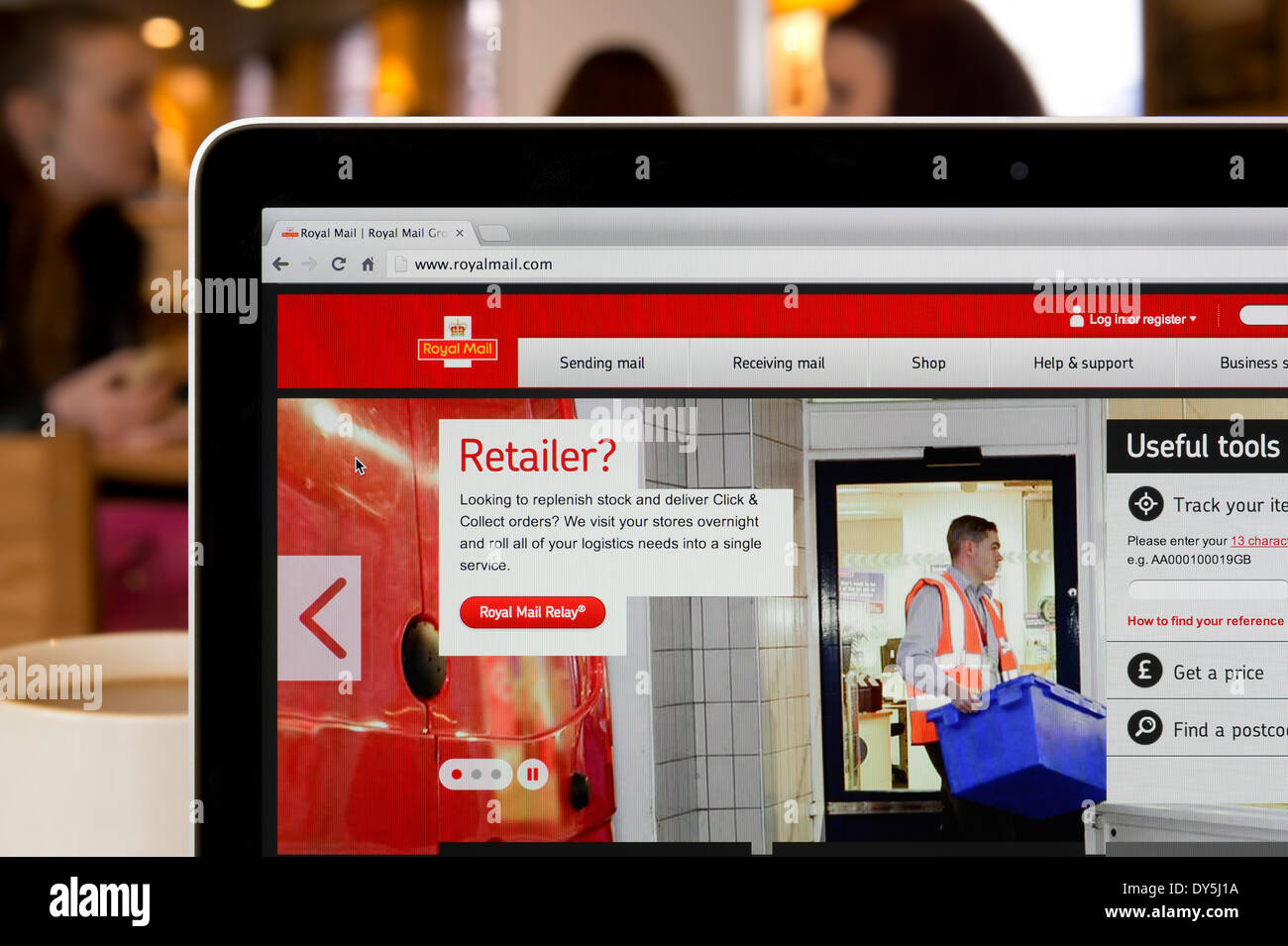 The Royal Mail website shot in a coffee shop environment (Editorial use ...
