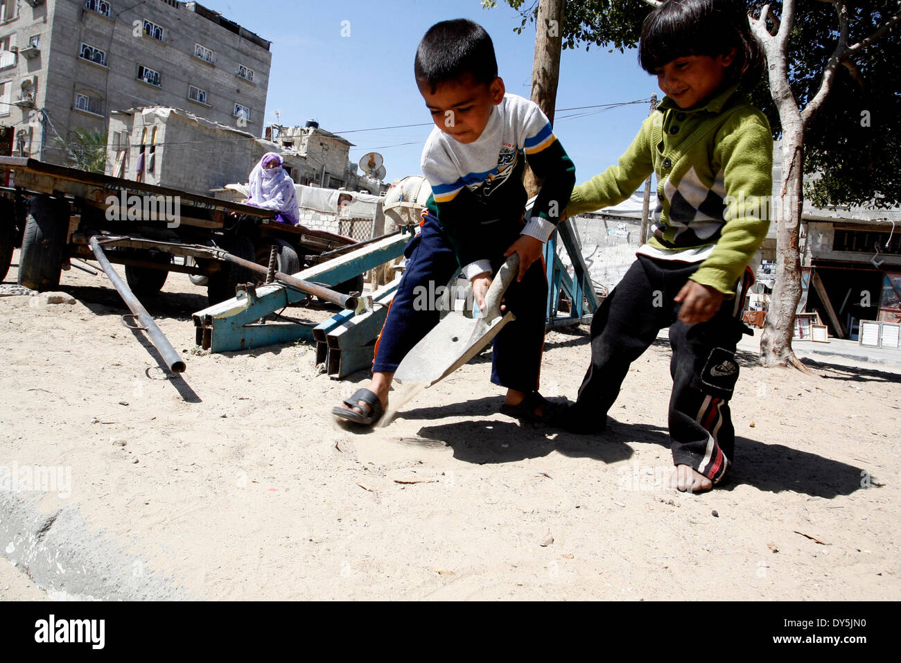 GAZA, PALESTINE - APRIL 5: Palestinian children playing at a street ...