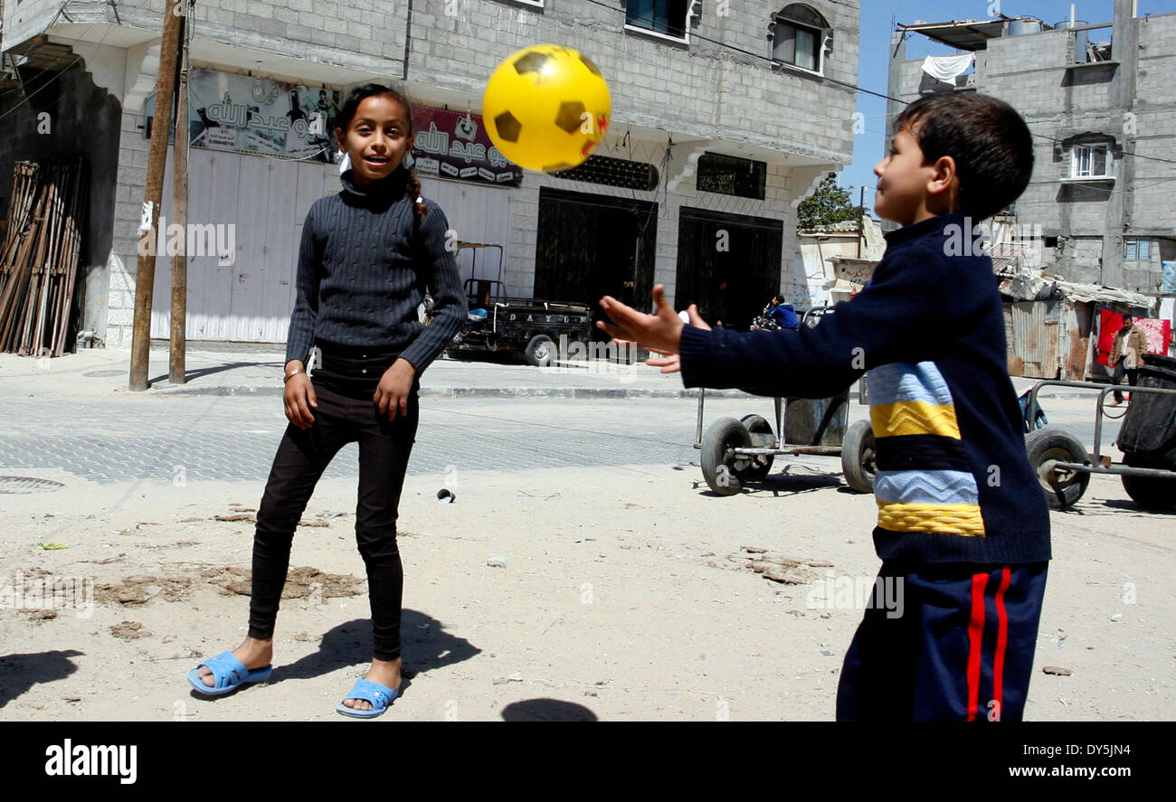 GAZA, PALESTINE - APRIL 5: Palestinian children playing at a street ...