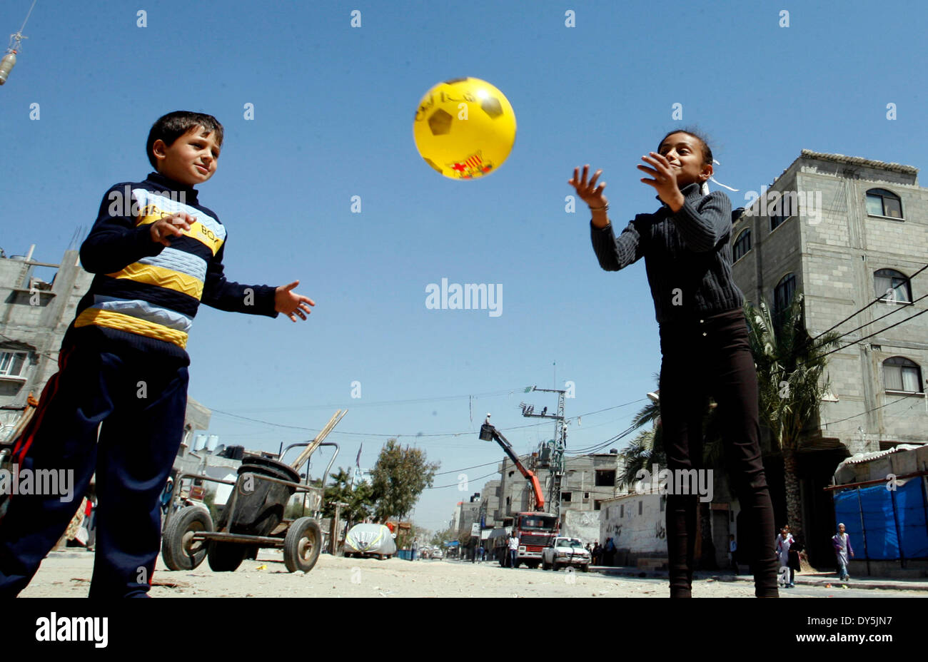GAZA, PALESTINE - APRIL 5: Palestinian children playing at a street ...