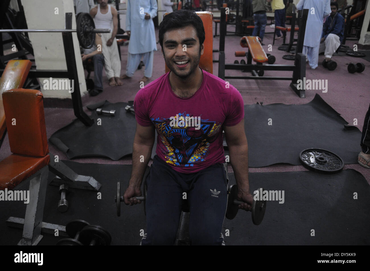 ISLAMABAD, PAKISTAN - APRIL 07: A Pakistani man lifts weights on World ...