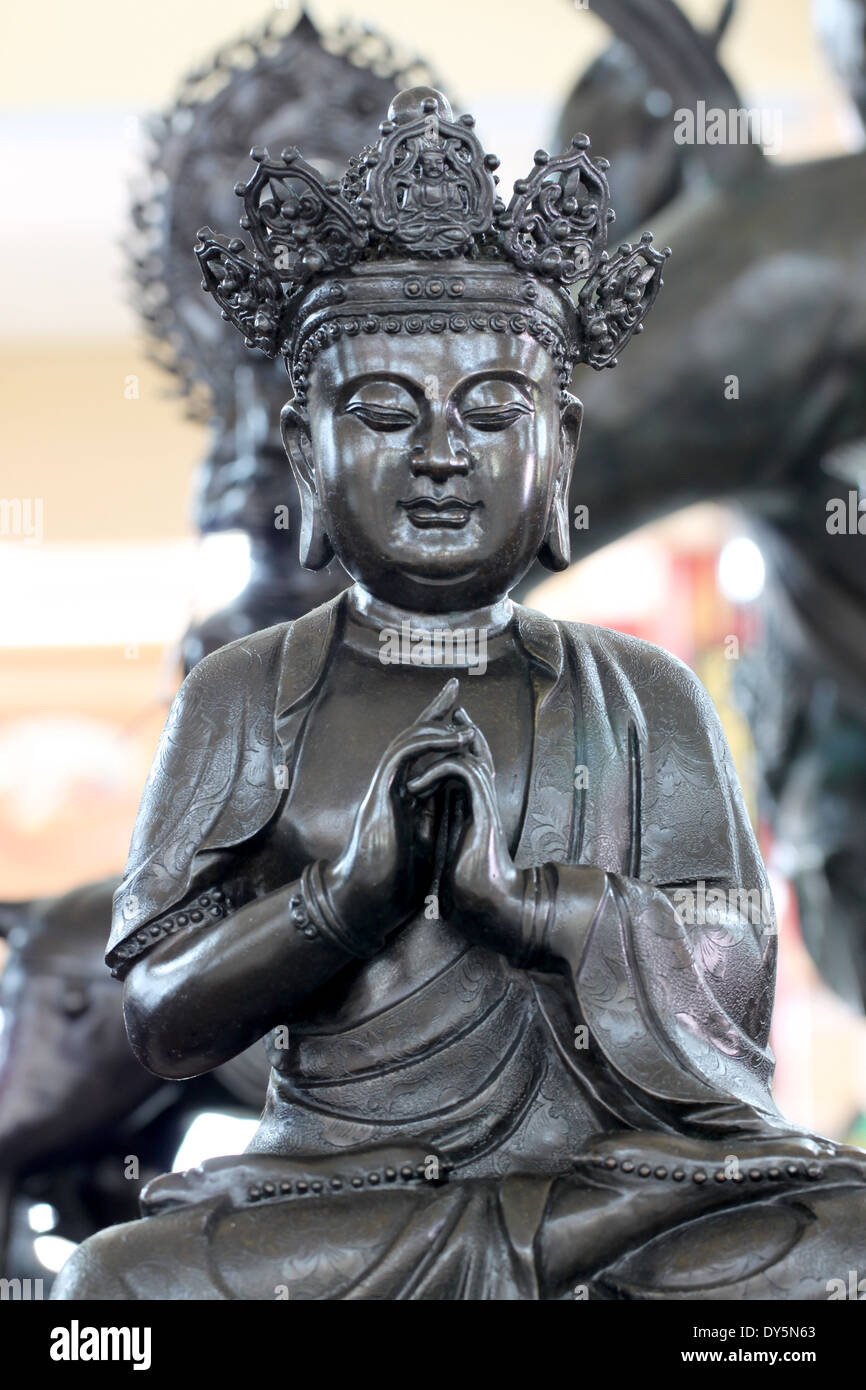 Black deity statues of Chinese religion in temple Stock Photo - Alamy