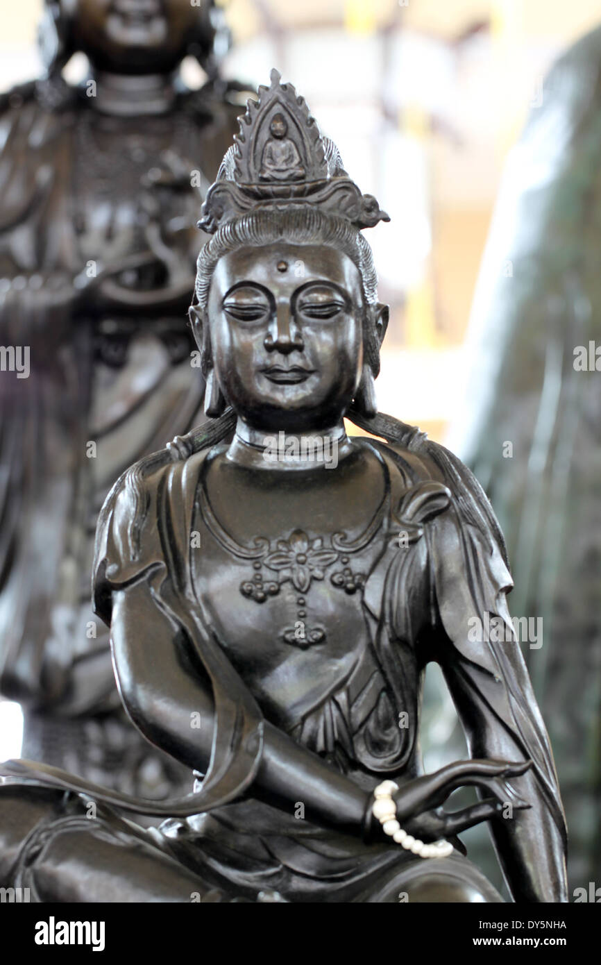 Black deity statues of Chinese religion in temple Stock Photo - Alamy