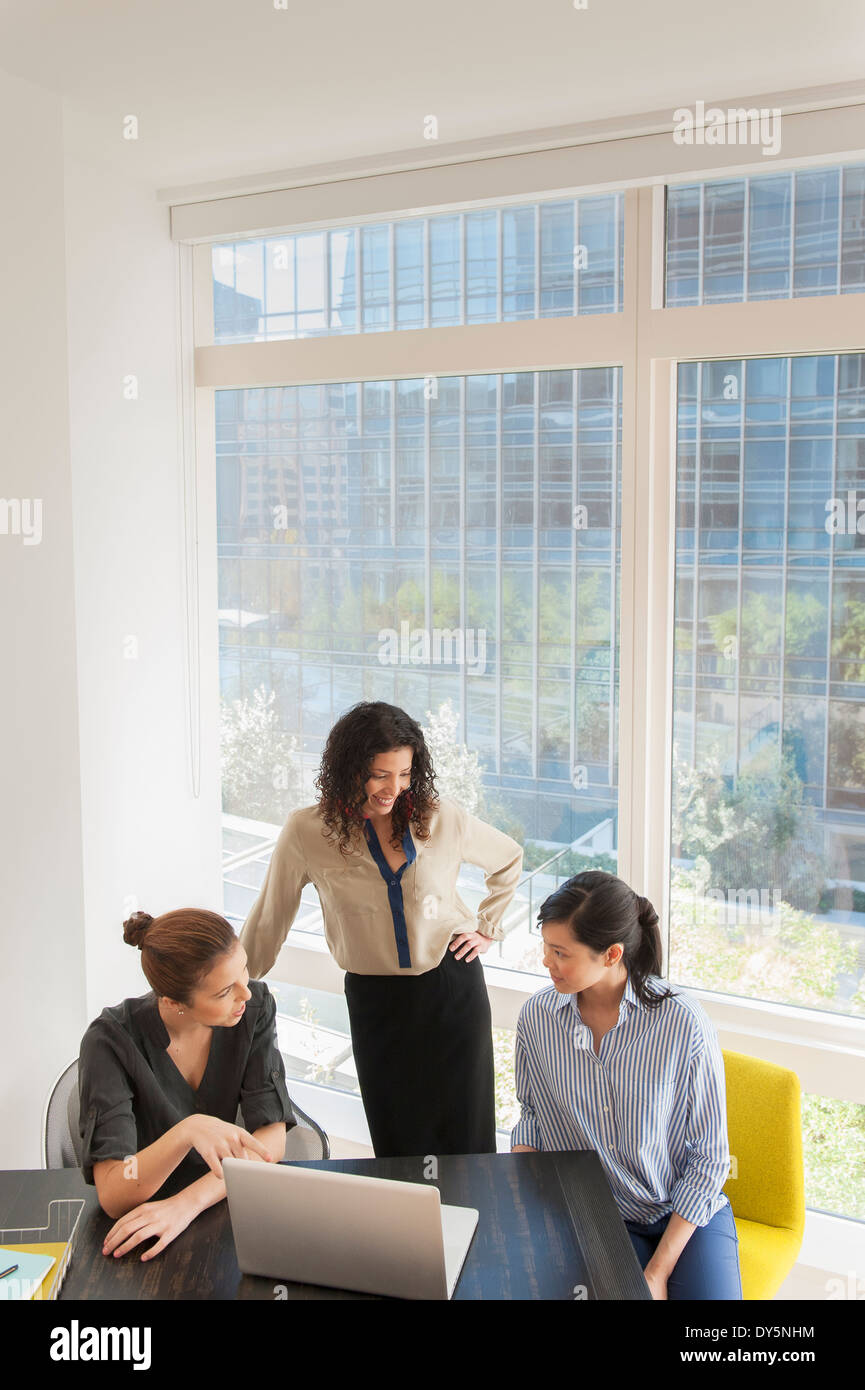 Young businesswomen and client meeting in office Stock Photo - Alamy
