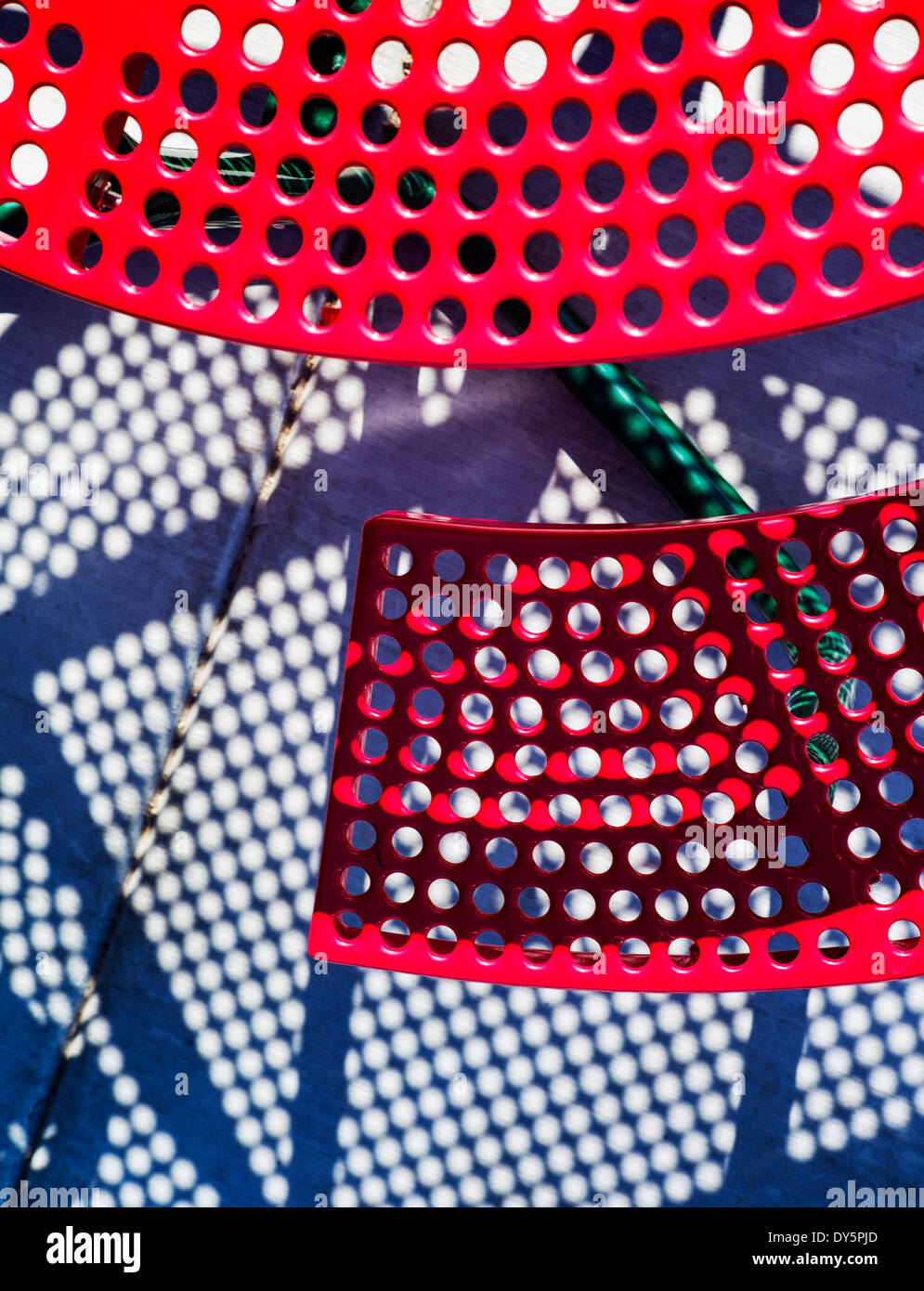 Abstract photograph of colorful red patio table and bench Stock Photo ...