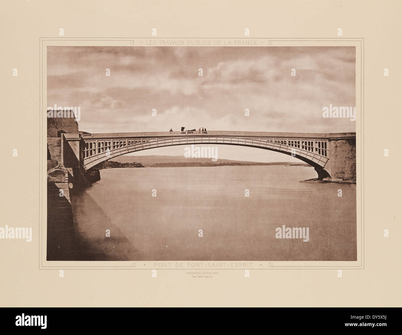 The Pont de Pont-Saint-Esprit, a historic bridge spanning a river in ...