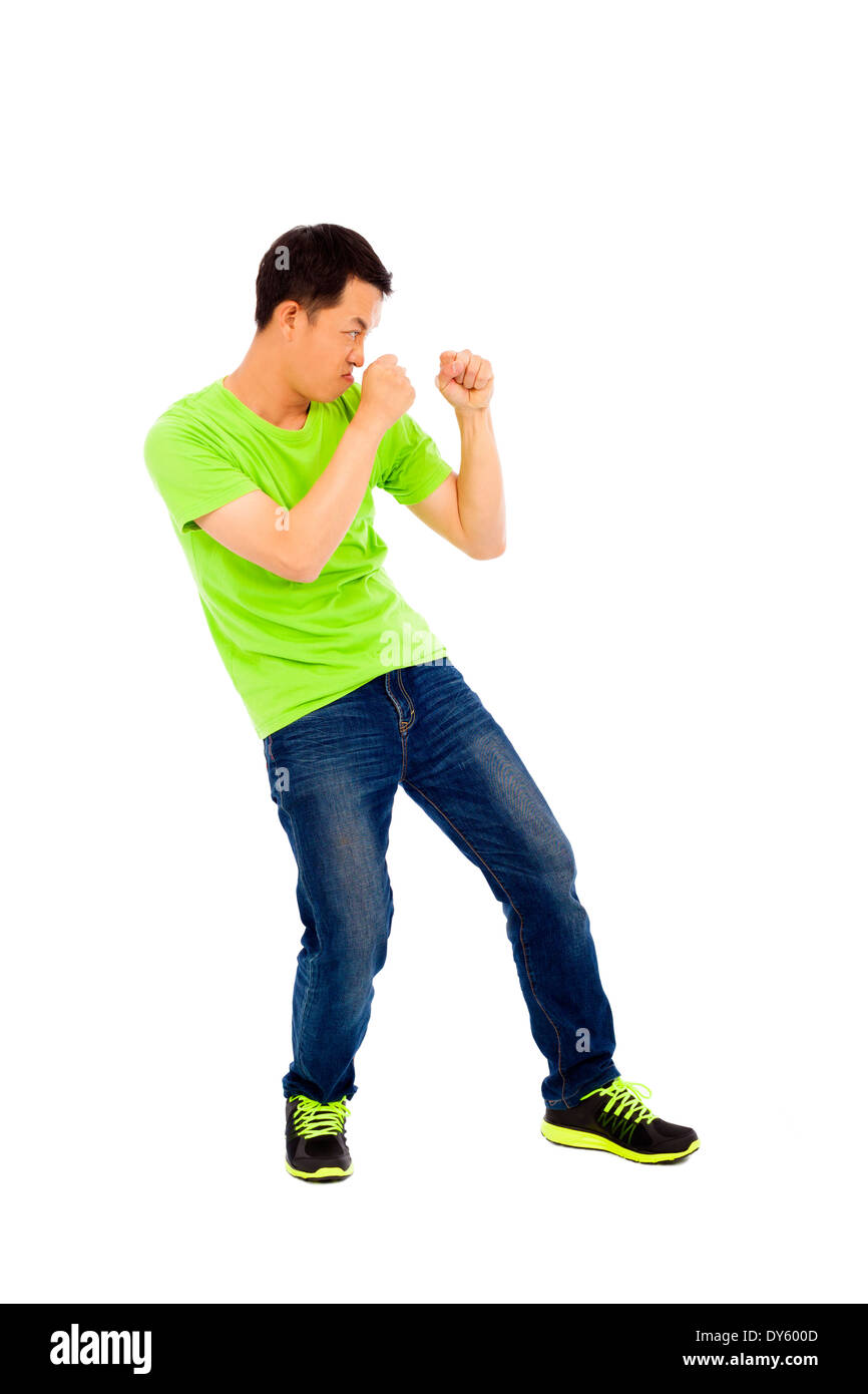 young man imitate boxing ready pose in studio Stock Photo - Alamy