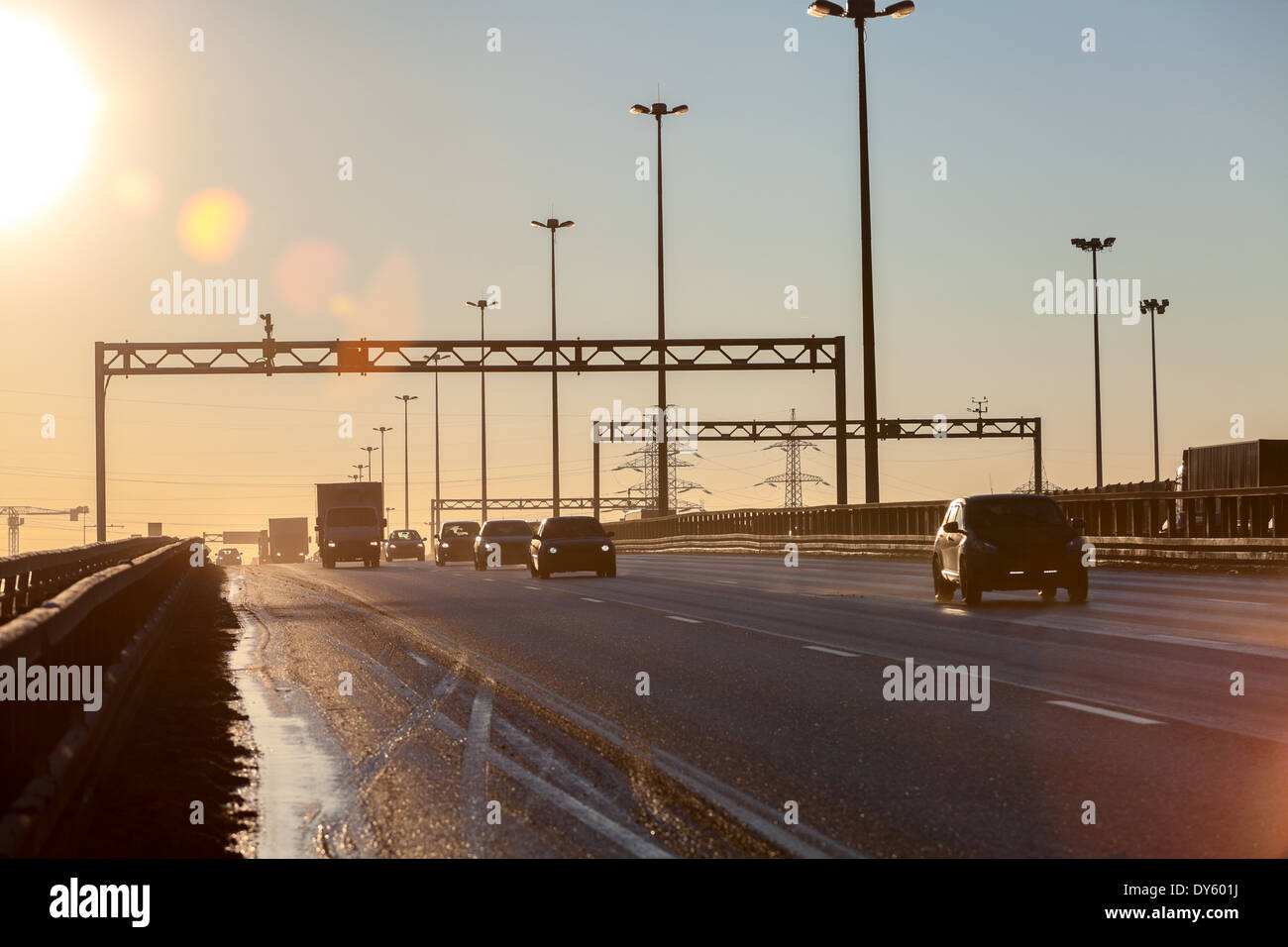 Ring road with cars silhouettes during sunset Stock Photo - Alamy
