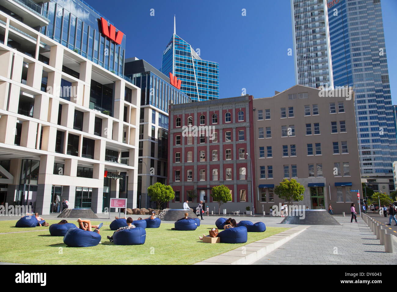 People sitting outside Westpac building in Takutai Square in Britomart ...
