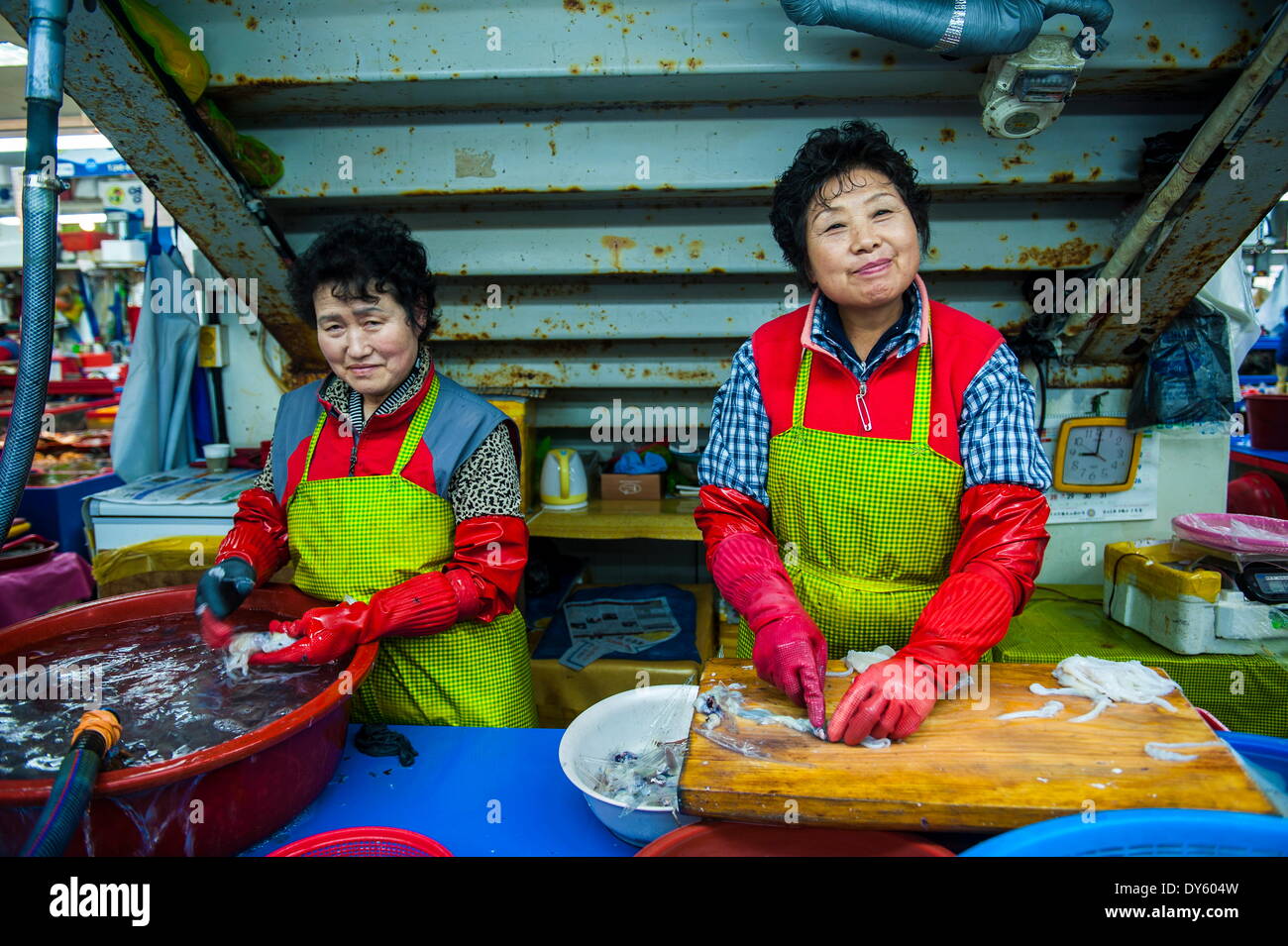 Women selling fish at the modern fish market in Busan, South Korea ...