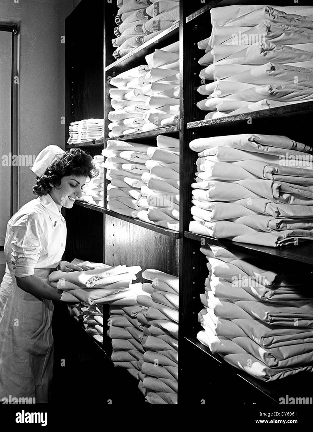 The image shows a nurse in a hospital linen closet at the Pepperell ...