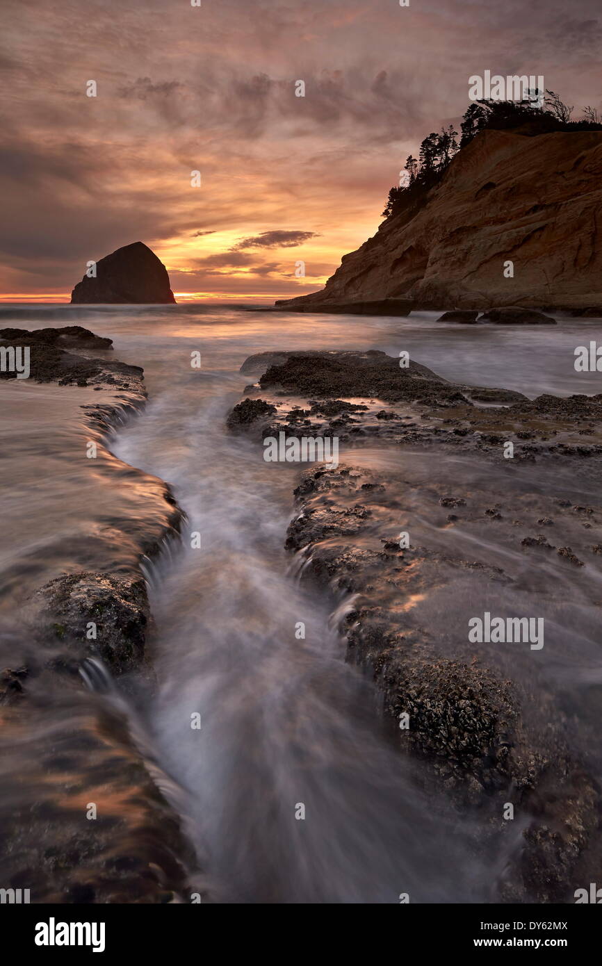 Haystack Rock at sunset, Pacific City, Oregon, United States of America ...