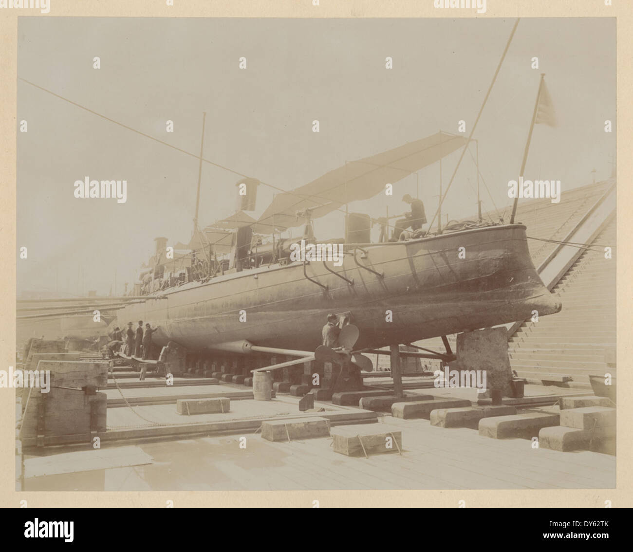 U.S. Navy torpedo boats undergoing maintenance in drydock at Herreshoff ...