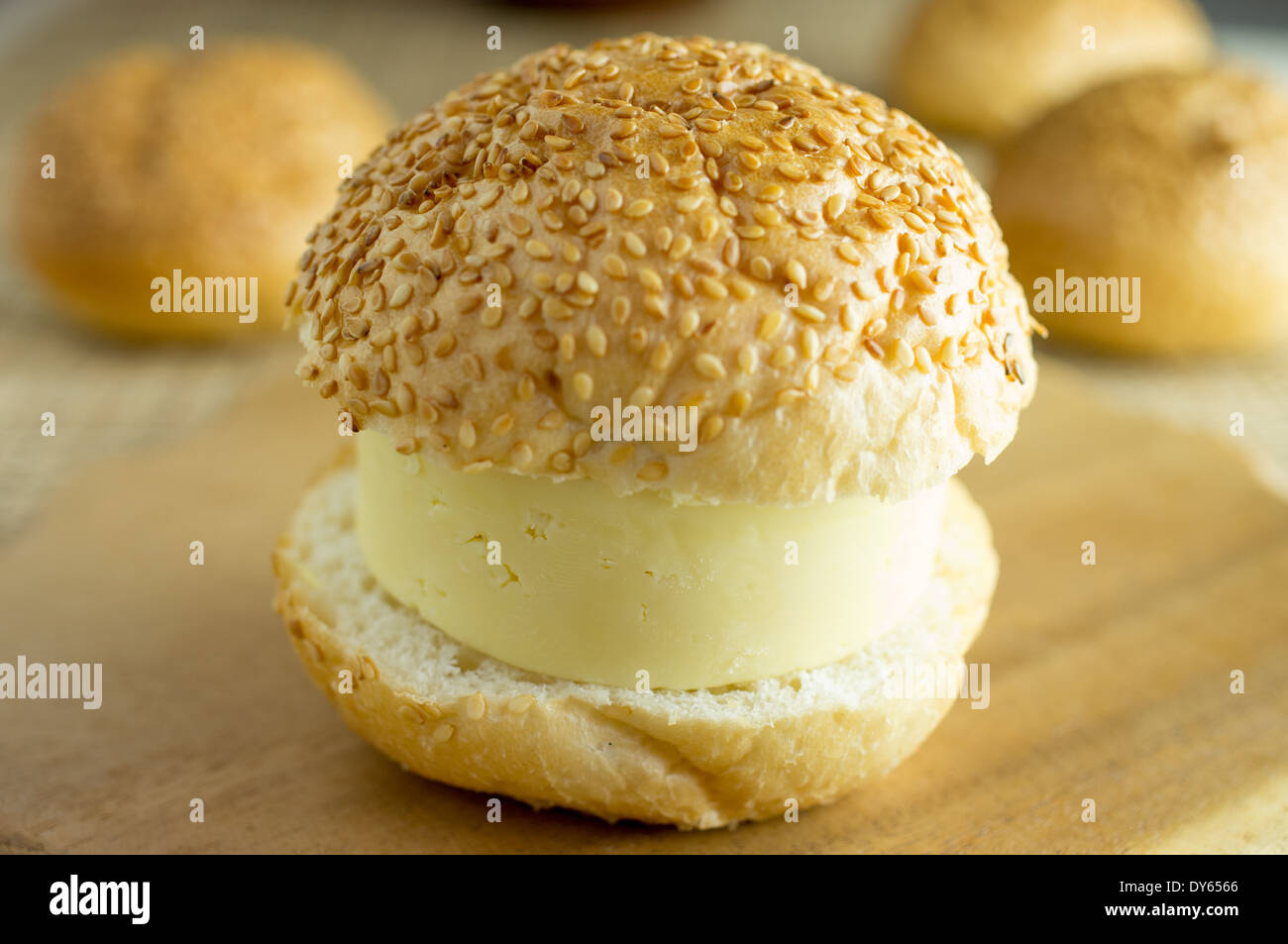 Bun with sesame seeds and cheese sandwich with sweet yellow pepper ...