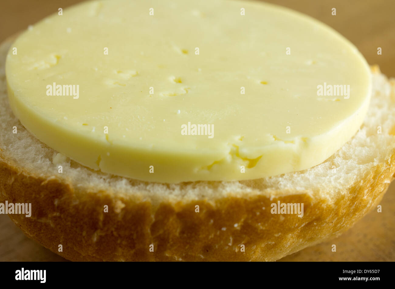 Bun sandwich with cheese closeup Stock Photo - Alamy