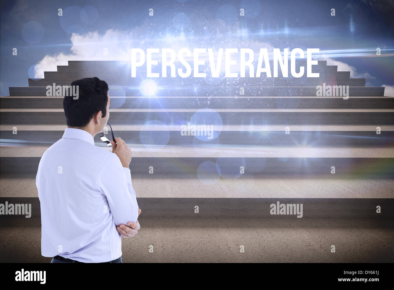 The word perseverance and businessman standing against city scene in a ...