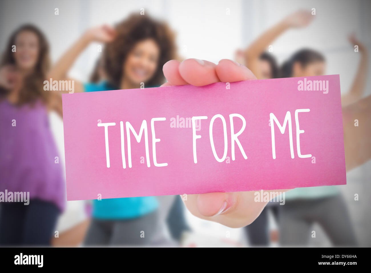 Woman holding pink card saying time for me Stock Photo - Alamy