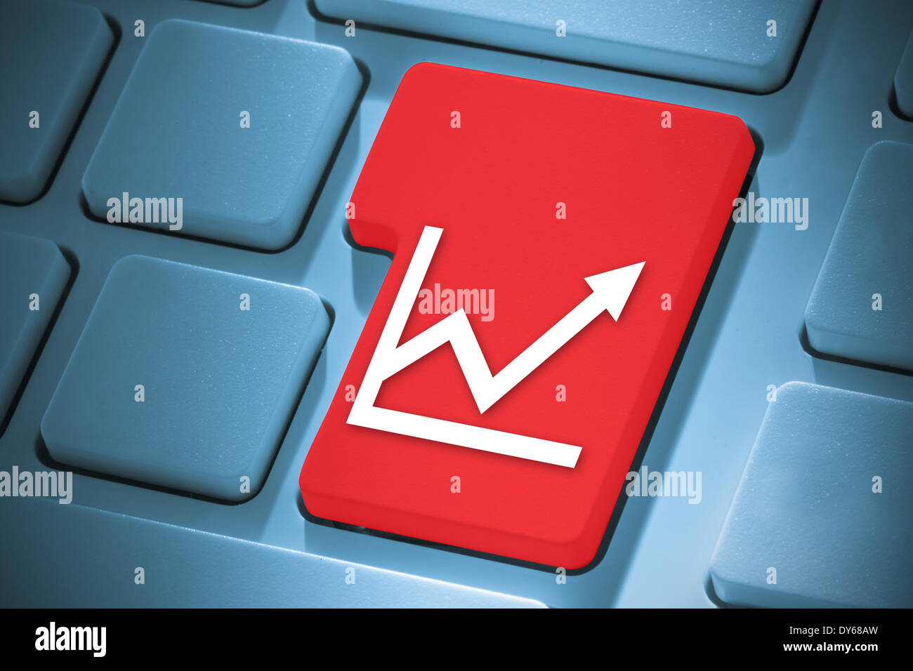 Composite image of graph and arrow on enter key Stock Photo - Alamy