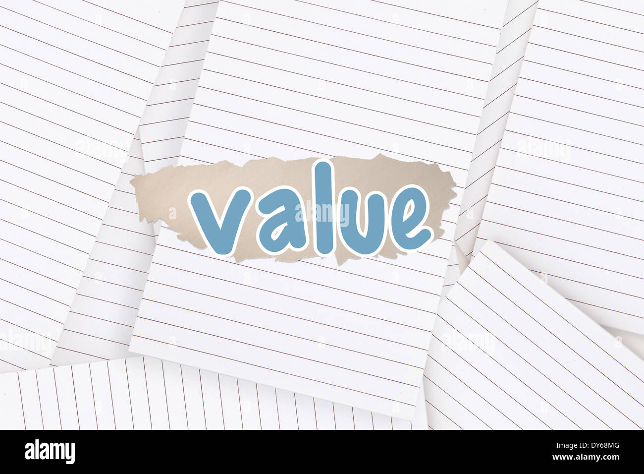 Value against lined paper strewn over surface Stock Photo - Alamy