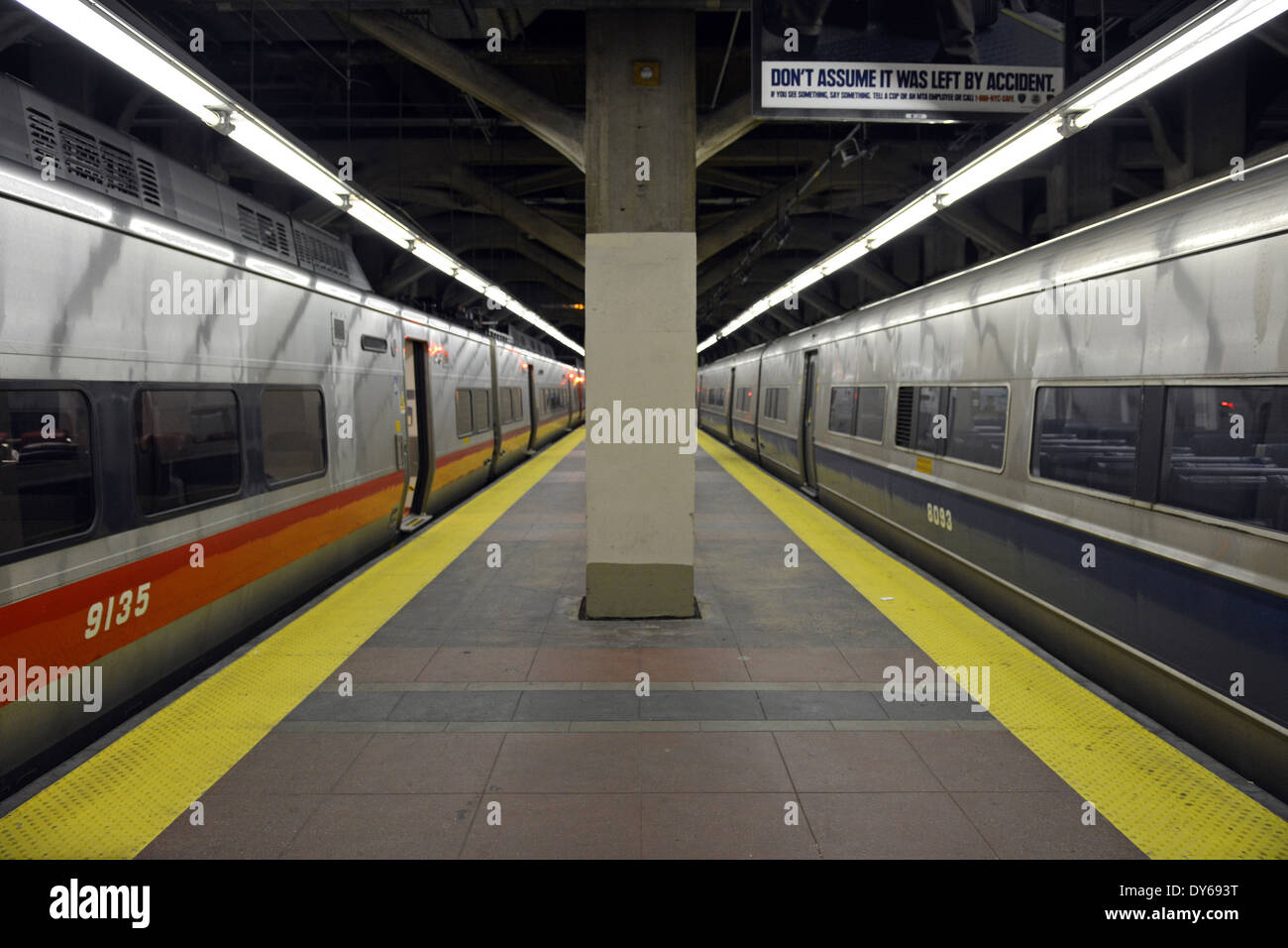 An empty platform with 2 Metro North commuter trains at Grand Central ...