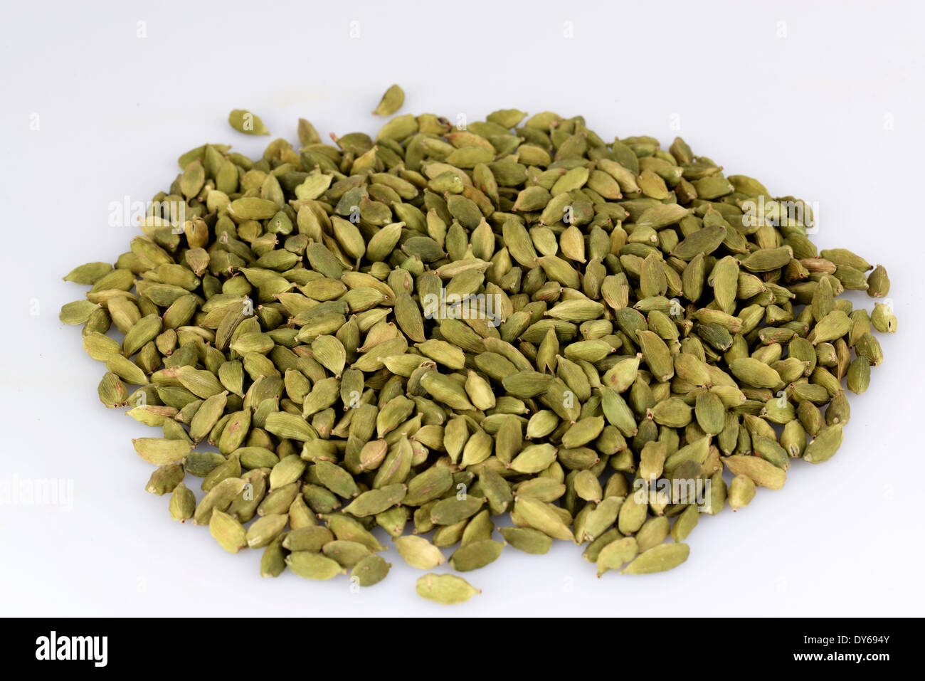 cardamom on white background Stock Photo - Alamy