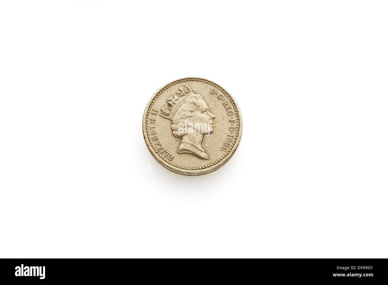 macro photograph of a pound coin with a shadow on a white background ...