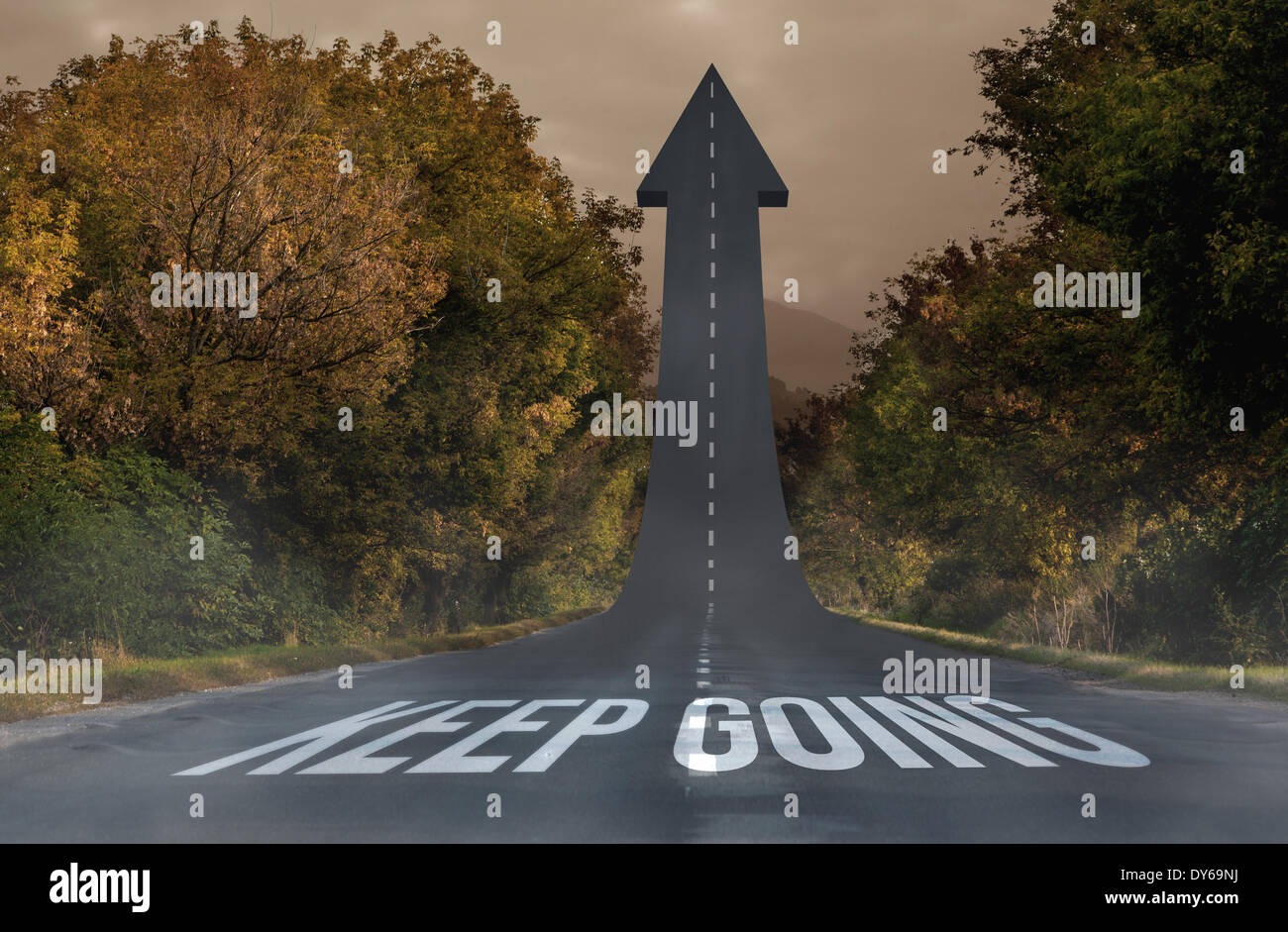 Keep going against road turning into arrow Stock Photo - Alamy