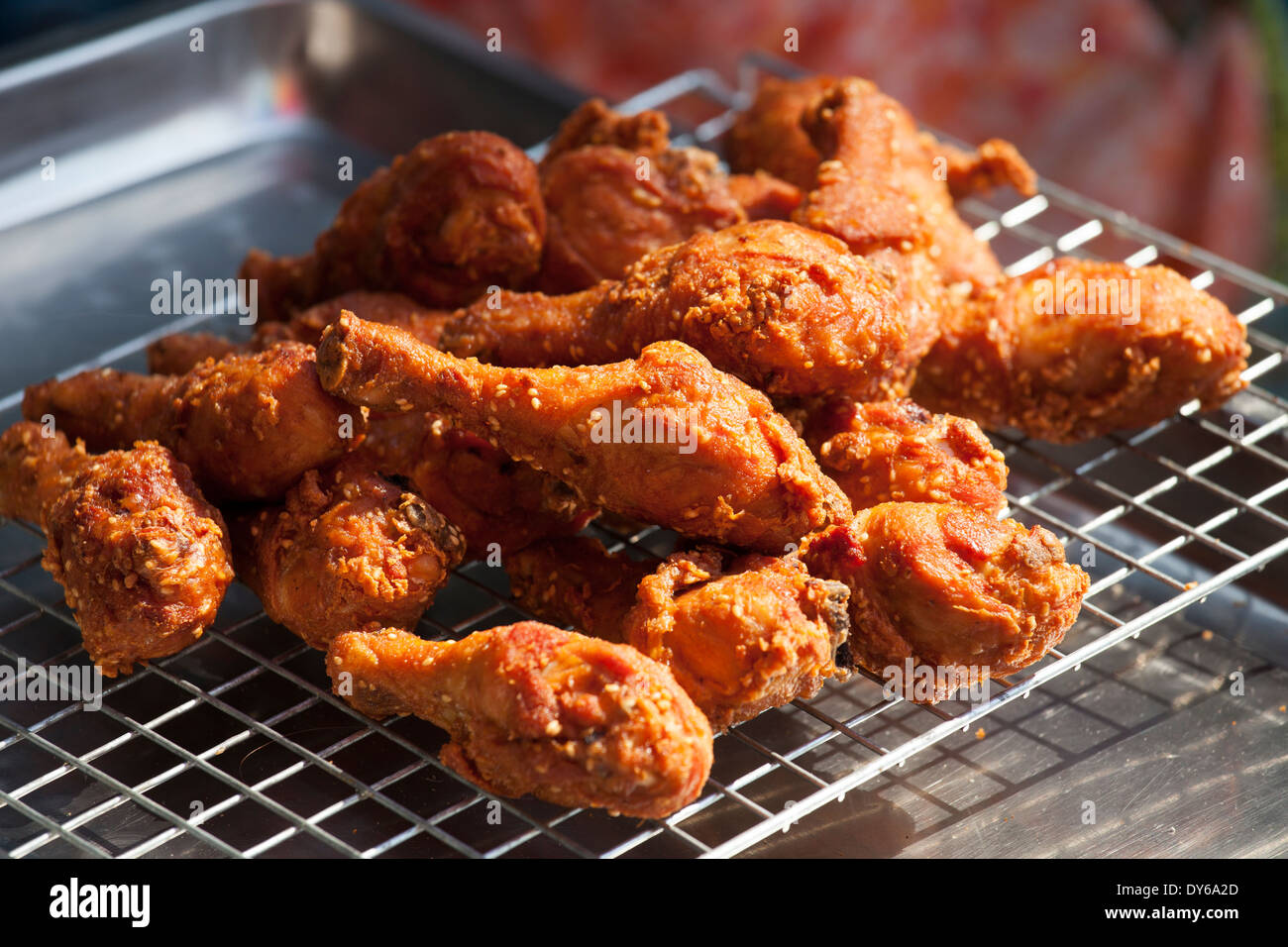 Fried chicken at a street vendor in Bangkok, Thailand Stock Photo - Alamy