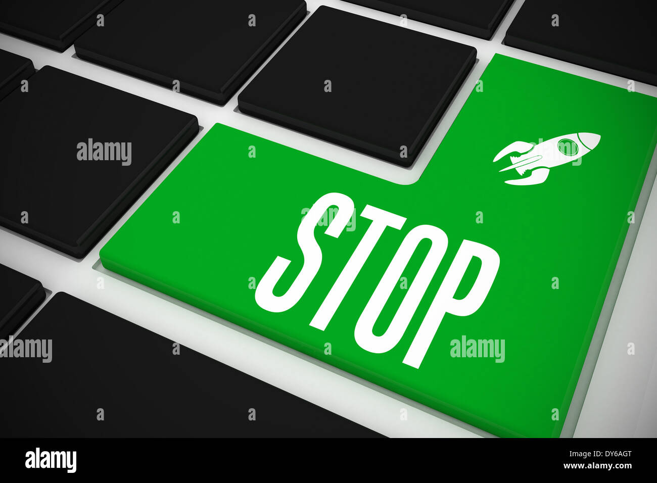Stop on black keyboard with green key Stock Photo - Alamy