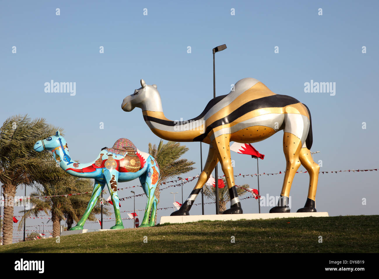 Colorful painted camels in Manama, Bahrain, Middle East Stock Photo - Alamy