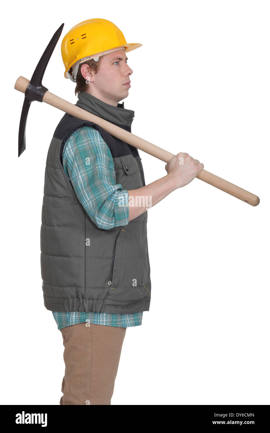 Construction worker with a pickaxe Stock Photo - Alamy