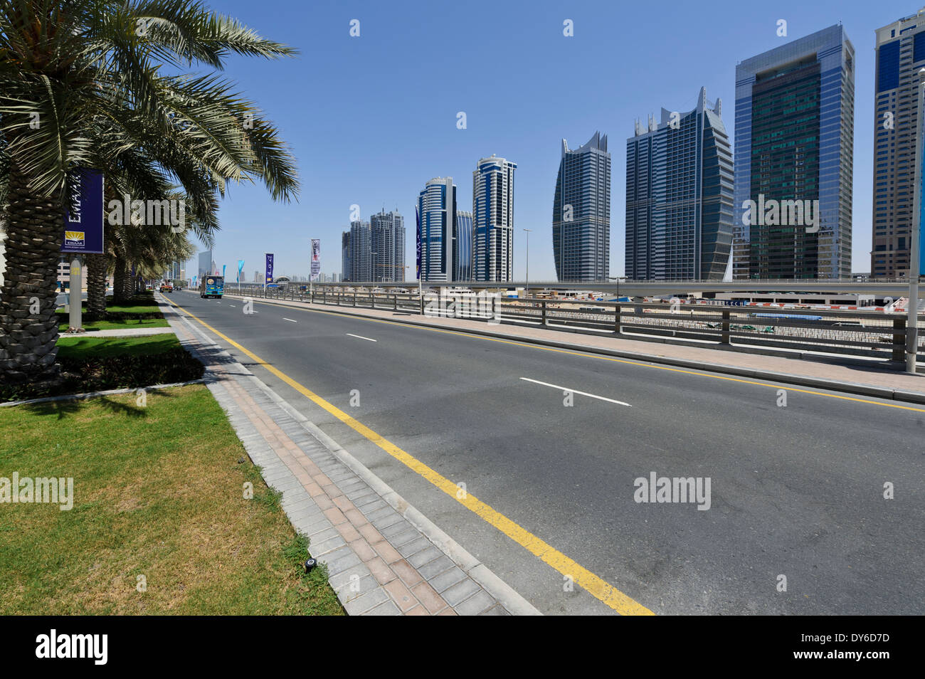 A row of modern skyscrapers along Sheikh Zayed Road, Dubai, United Arab ...