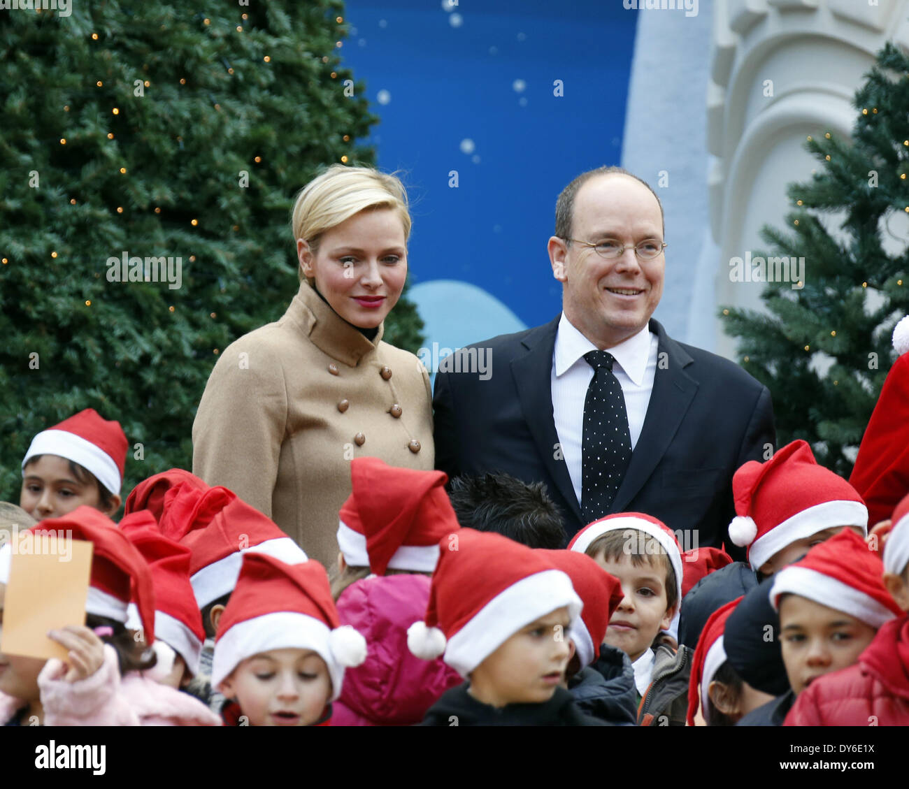 Prince Albert II of Monaco and Princess Charlene of Monaco hand out ...