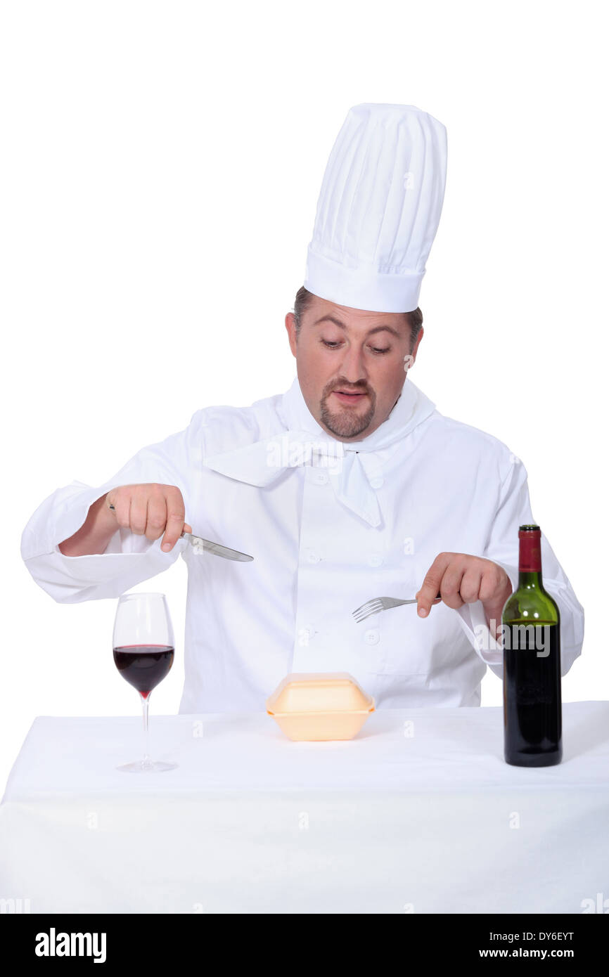 cook cutting burger packaging Stock Photo - Alamy