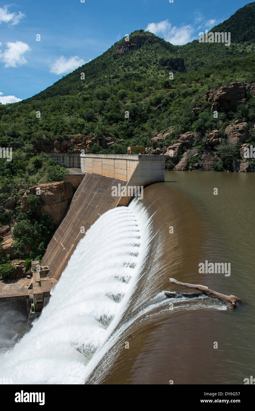 the swadini dam waterfall near the blyde river with the dragensberg as ...