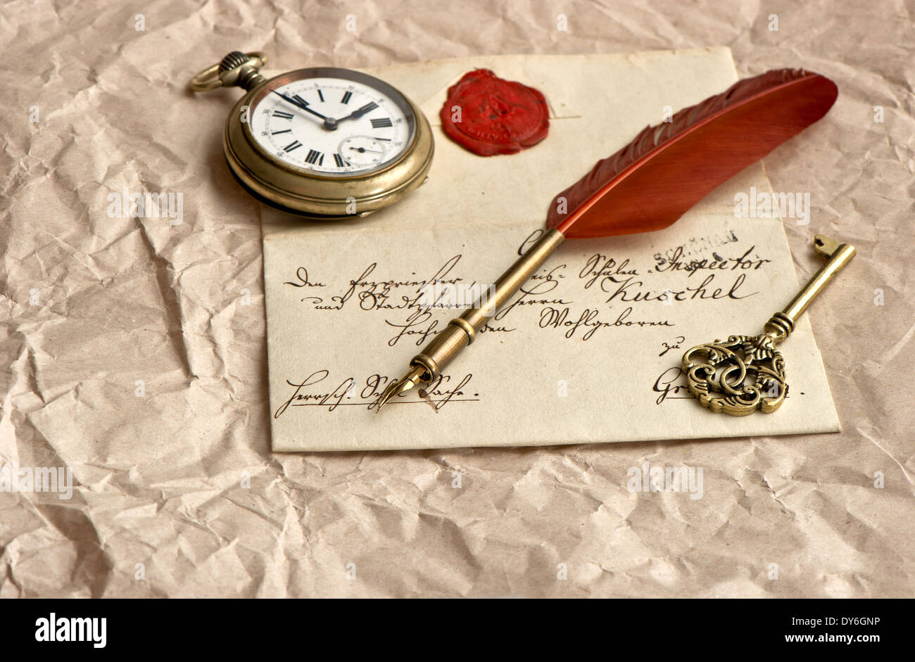 old letter with wax seal, vintage quill, clock and key Stock Photo - Alamy