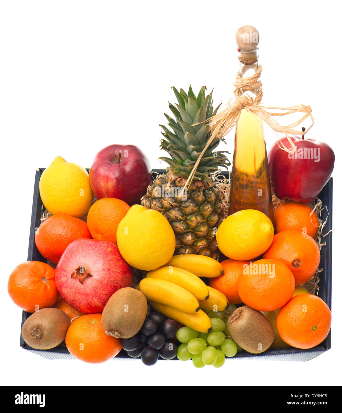 assorted fruits in the box and bottle of wine on white background Stock ...