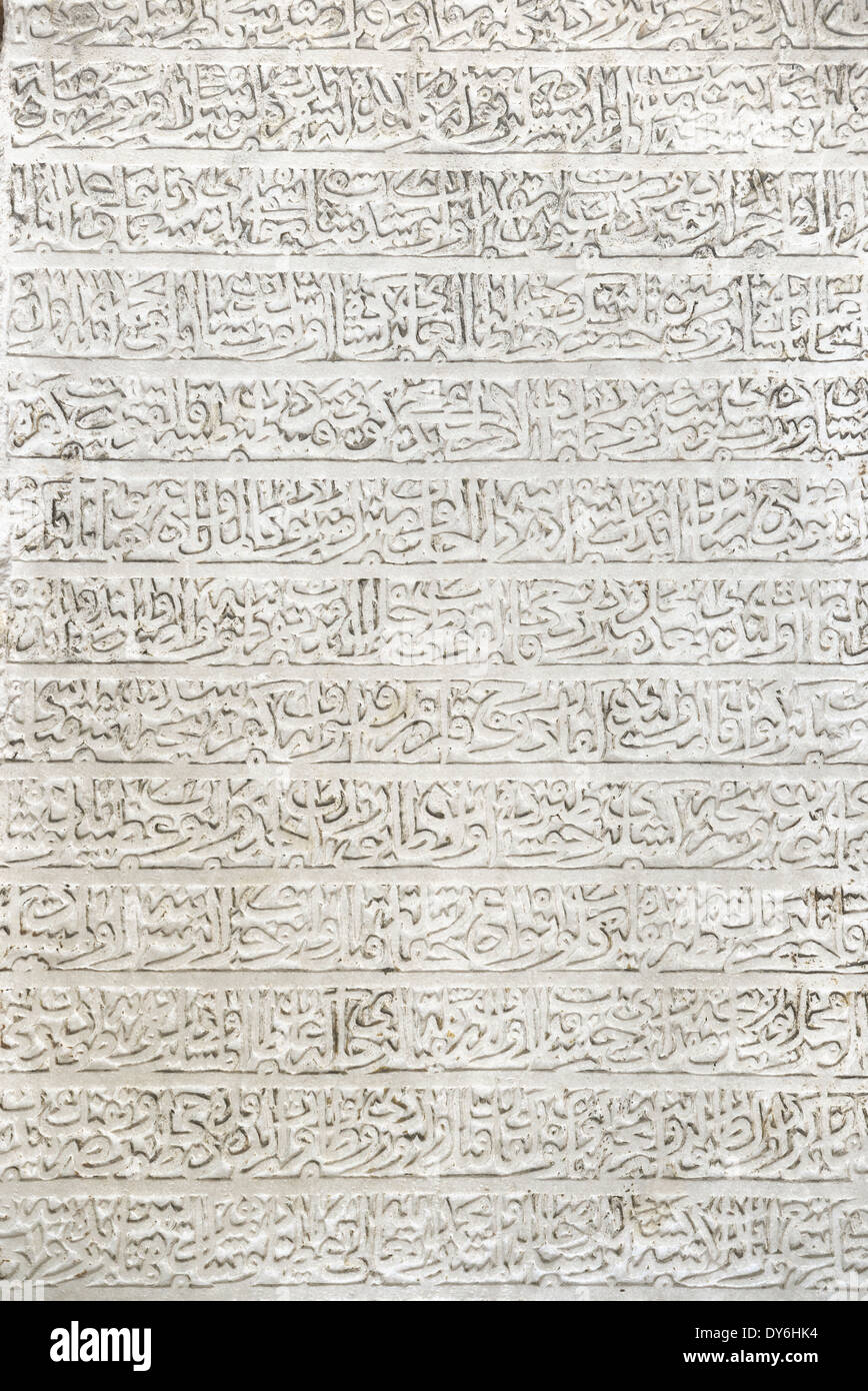 Backgrounds and textures: inscriptions in Arabic on a marble slab, text ...
