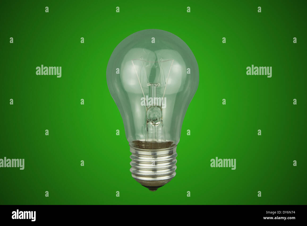 light bulb on a green background Stock Photo - Alamy
