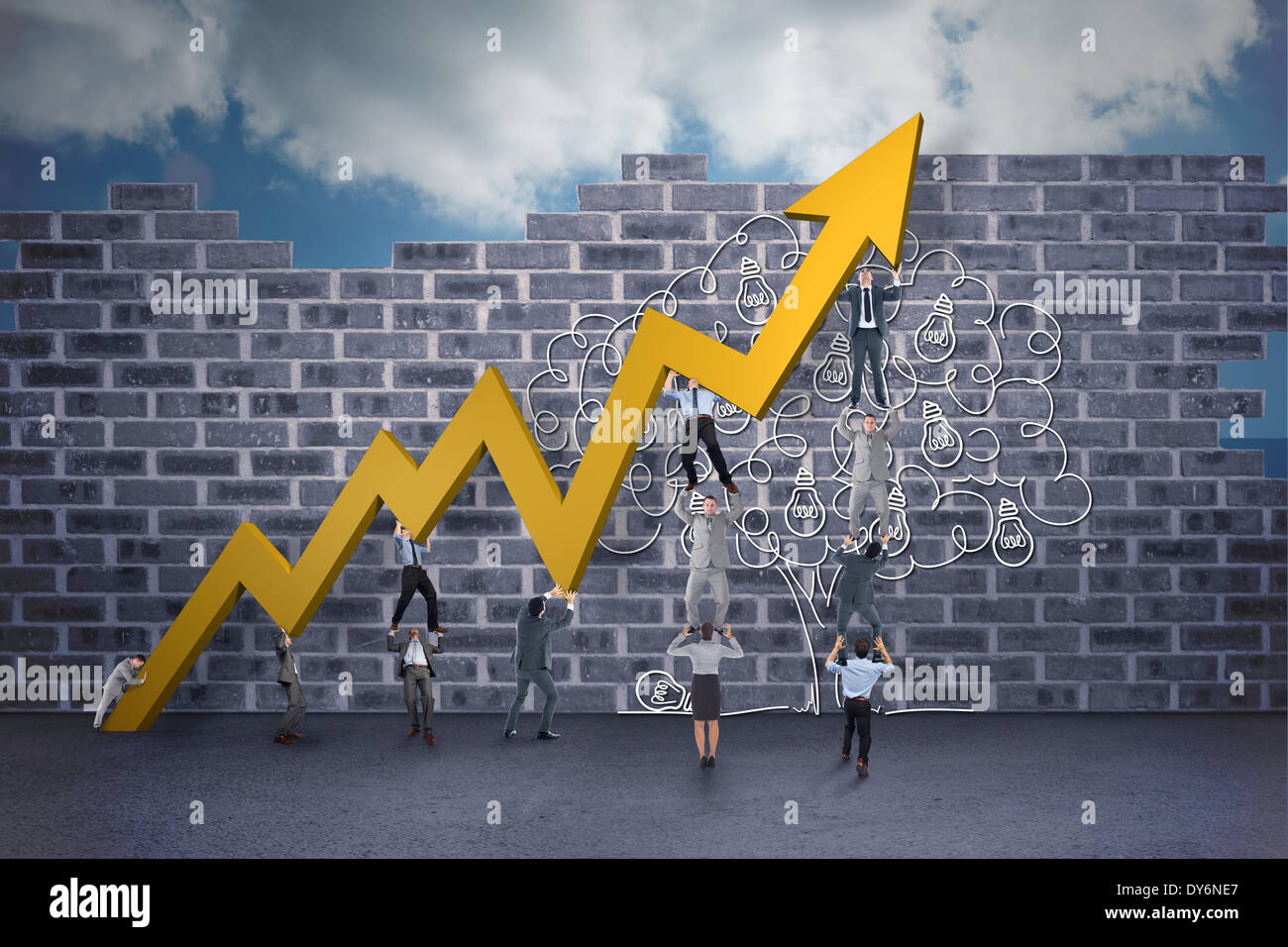 Composite image of business teamwork pushing arrow Stock Photo - Alamy