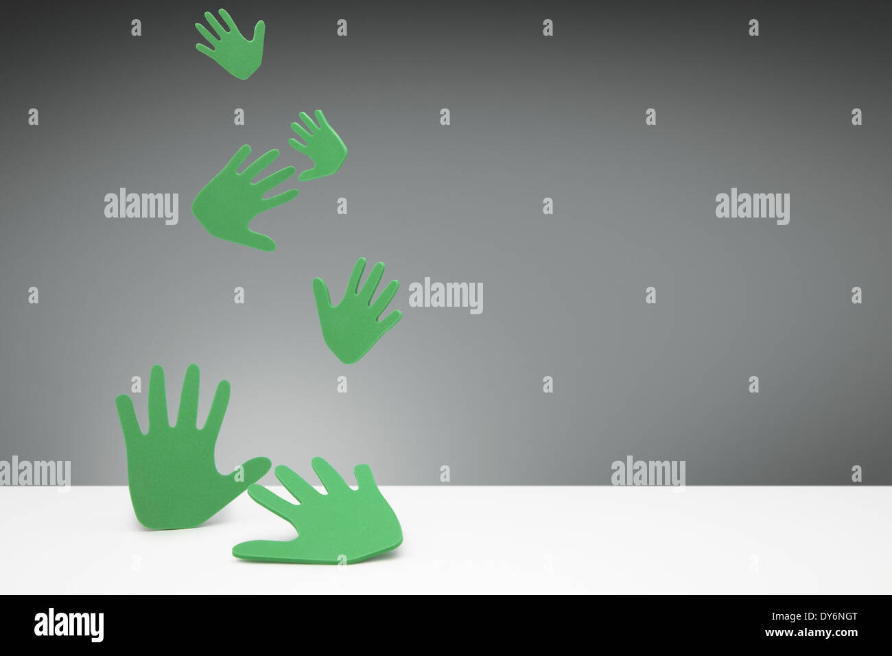green foam fingers concepts Stock Photo - Alamy