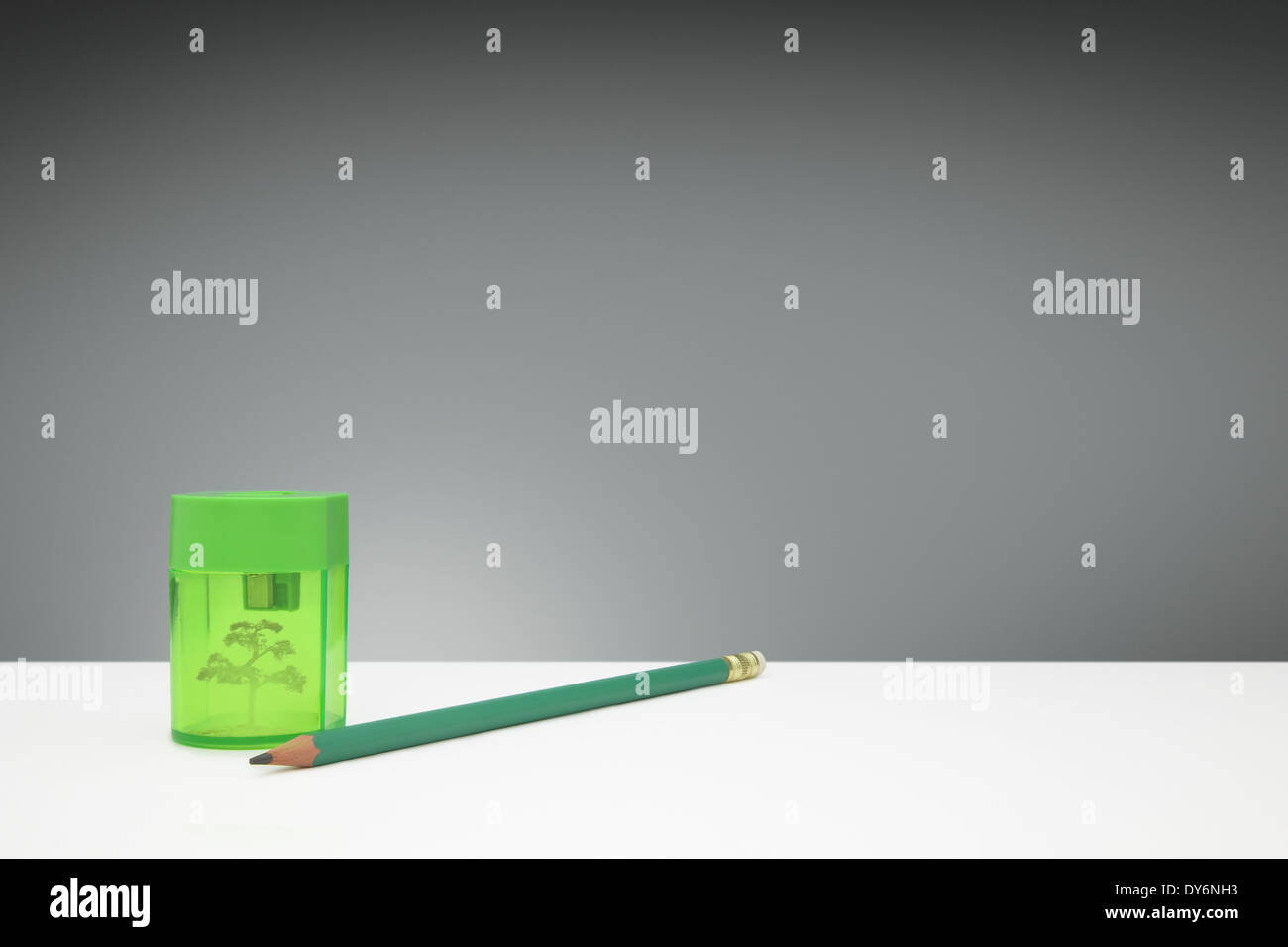 Green wooden pencil and green pencil sharpener with a tree inside Stock ...