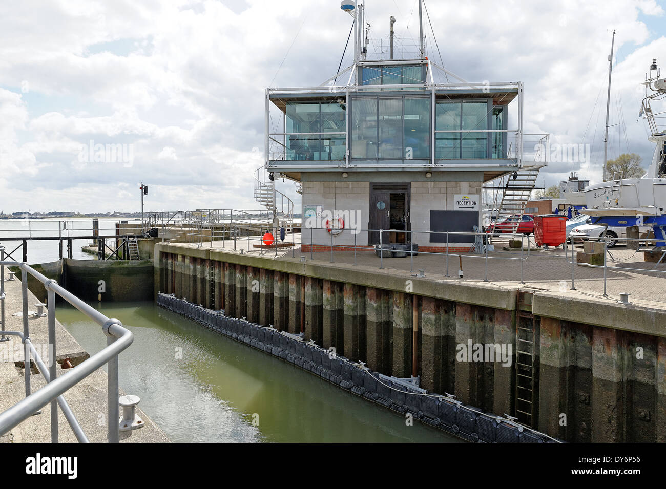 The entrance lock to Shotley Marina,Suffolk,UK, with control tower on ...