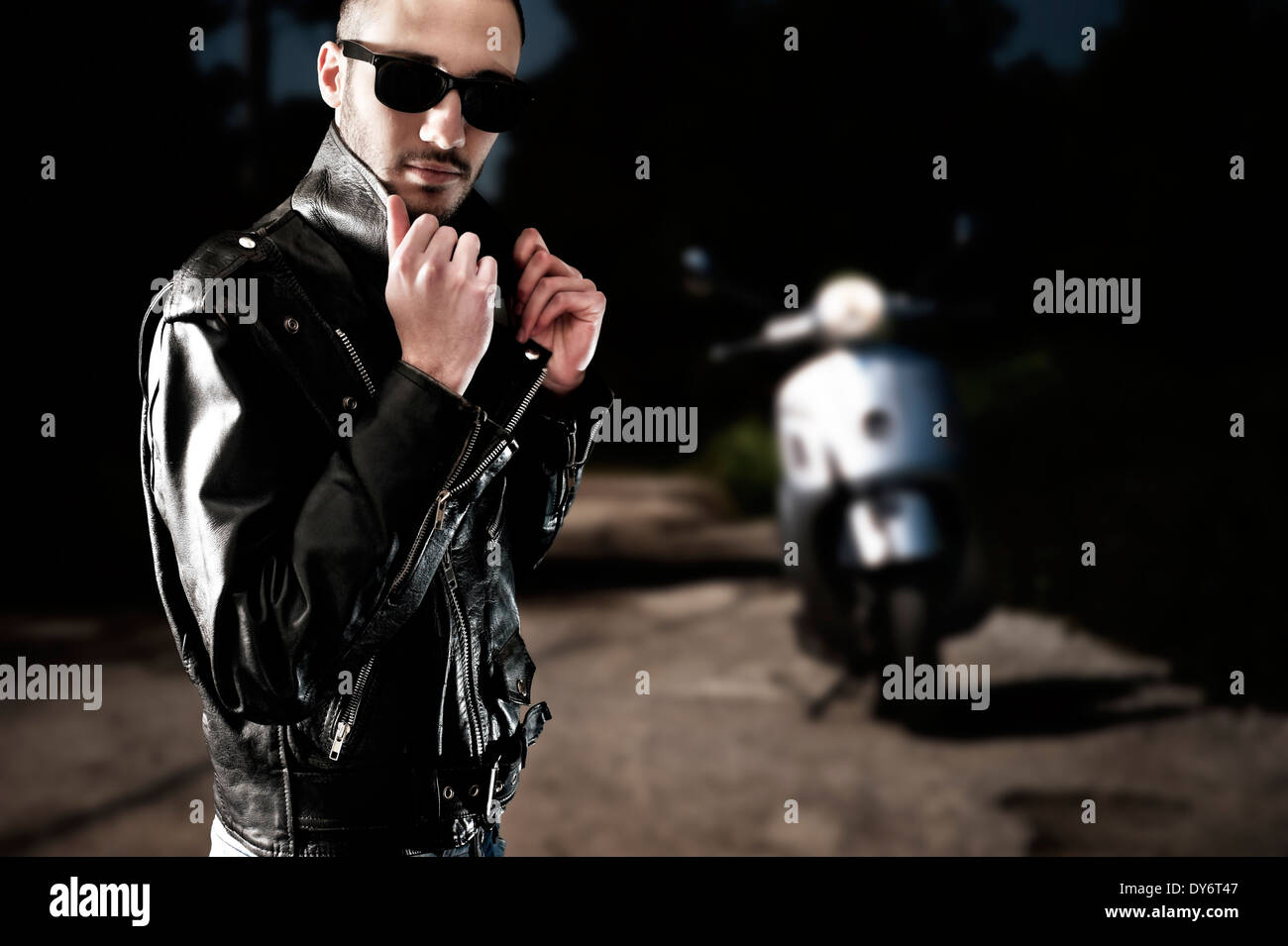 Posing biker hi-res stock photography and images - Alamy