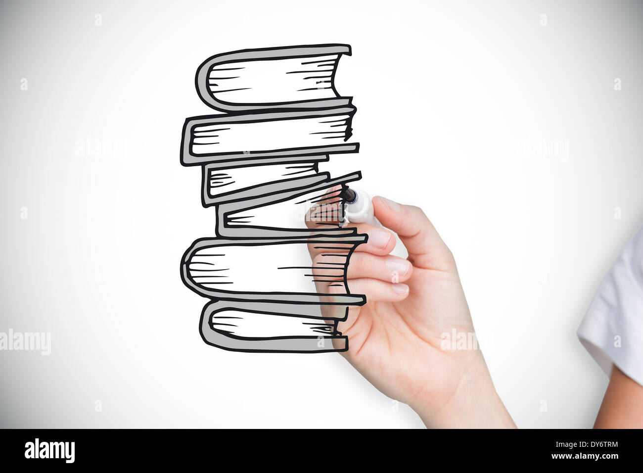 Composite image of businesswoman drawing books against white background ...