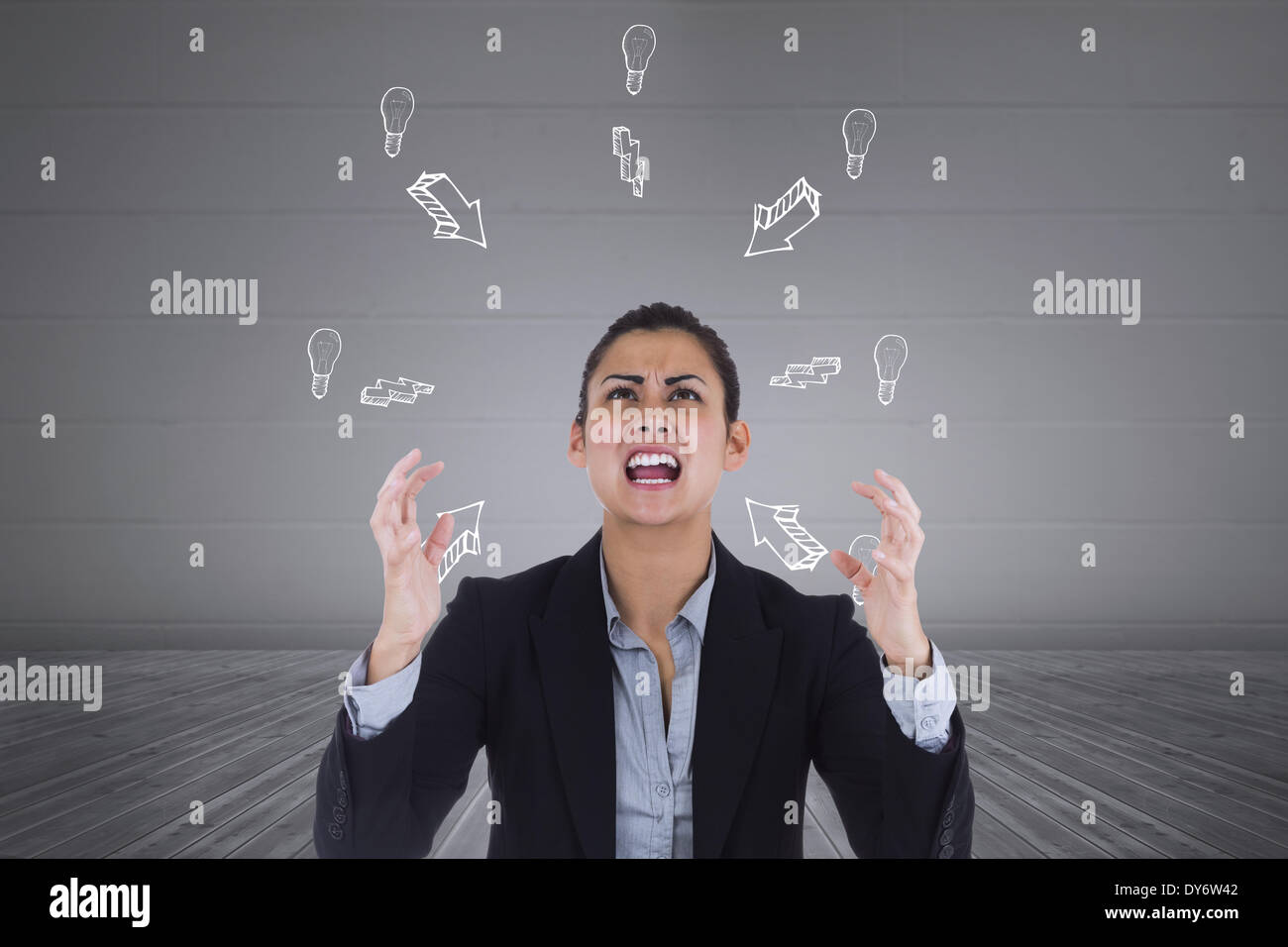 Composite image of angry businesswoman gesturing Stock Photo - Alamy