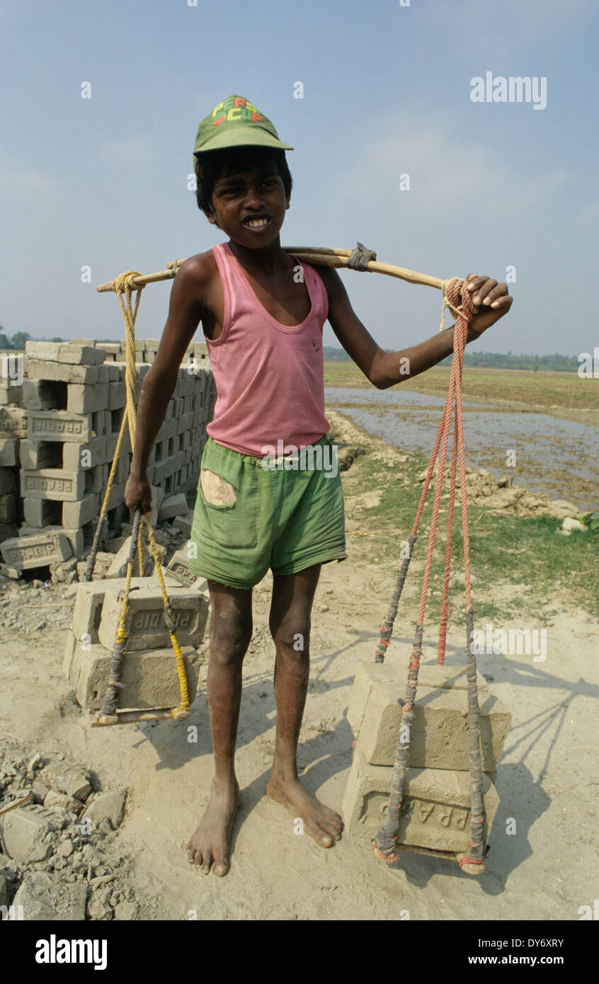 India Westbengal , children work in brick industry, children carry ...