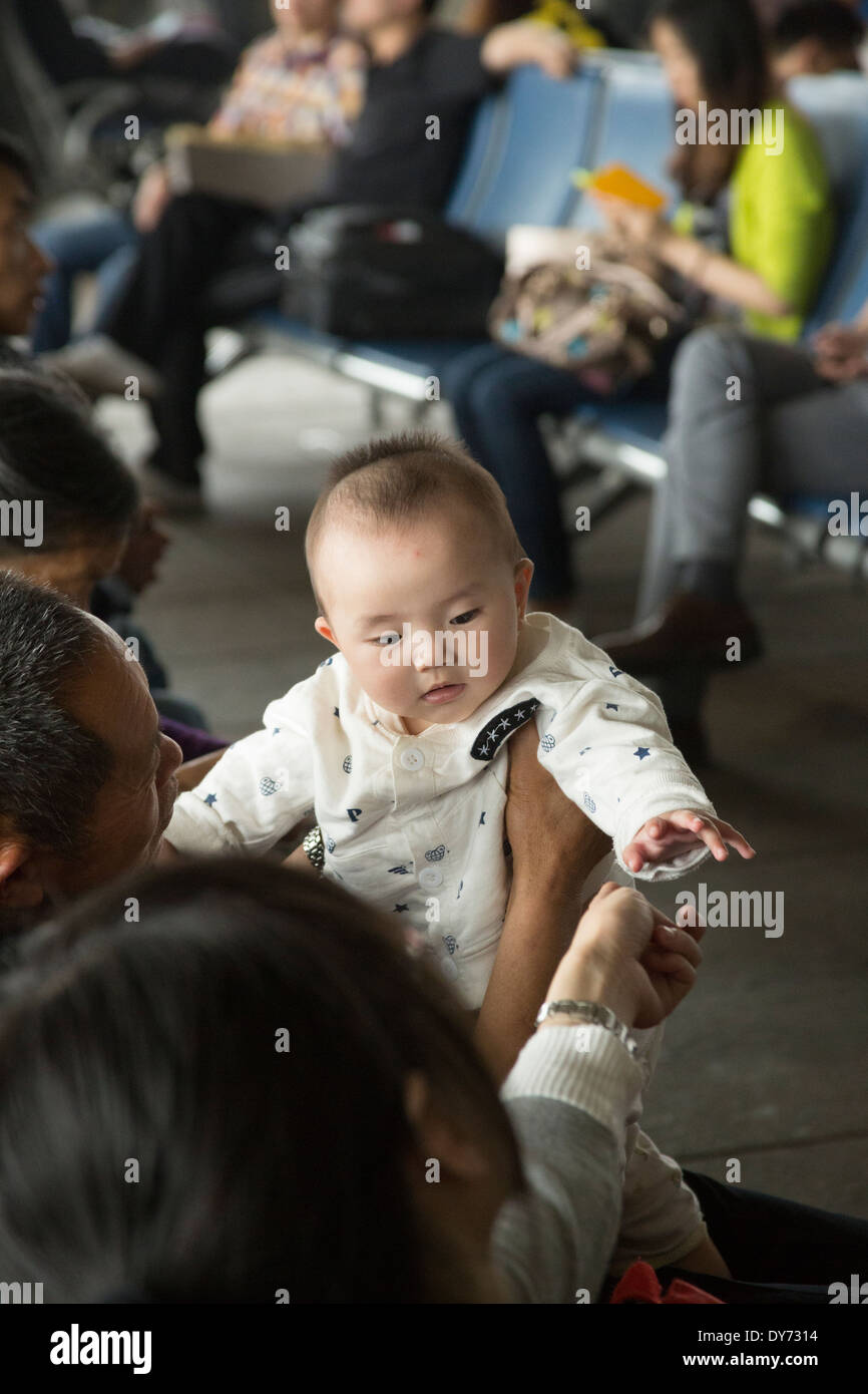Chinese family with baby in Chongqing rail station China Stock Photo ...