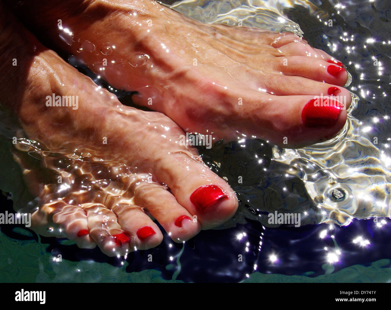Red toe nails hi-res stock photography and images - Alamy
